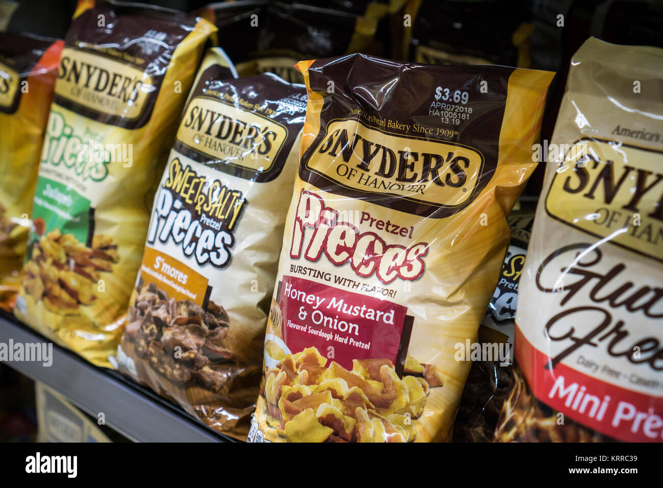 Packages of Snyder's brand snacks are seen in a supermarket in New York ...