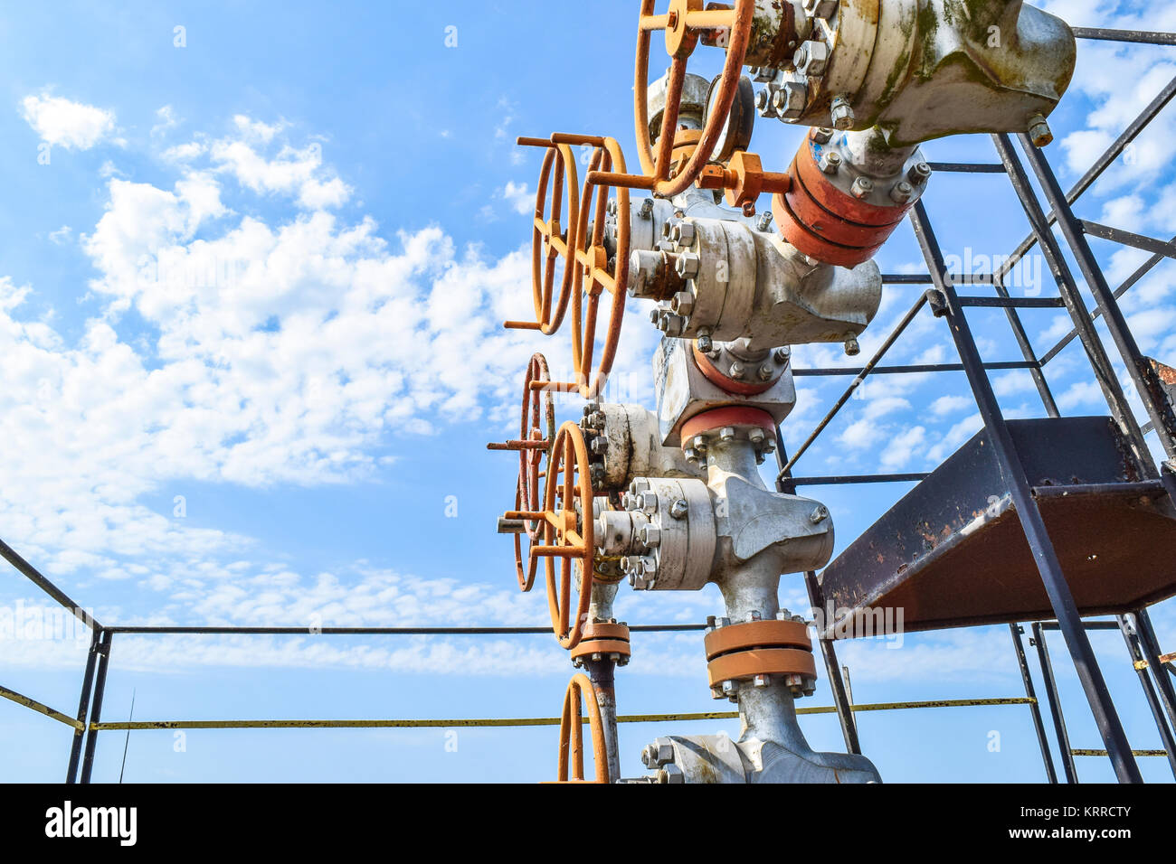 Well for oil and gas production. Oil well wellhead equipment. Oil ...