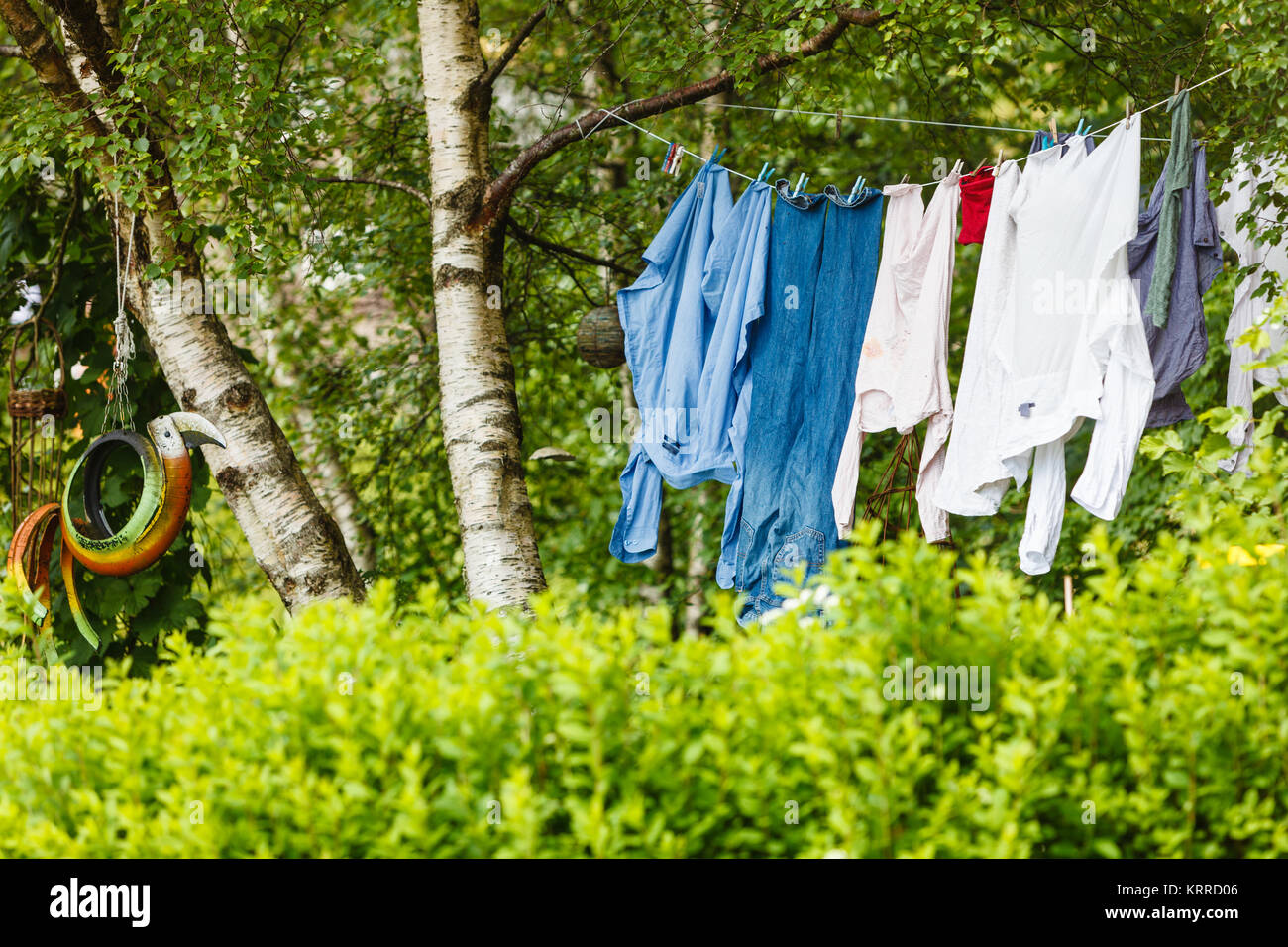 Eco, natural lifestyle and household duties concept. Laundry drying ...