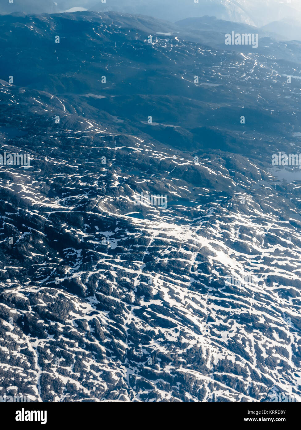 Birds eye. View from window of plane airplane flying over Norway ...