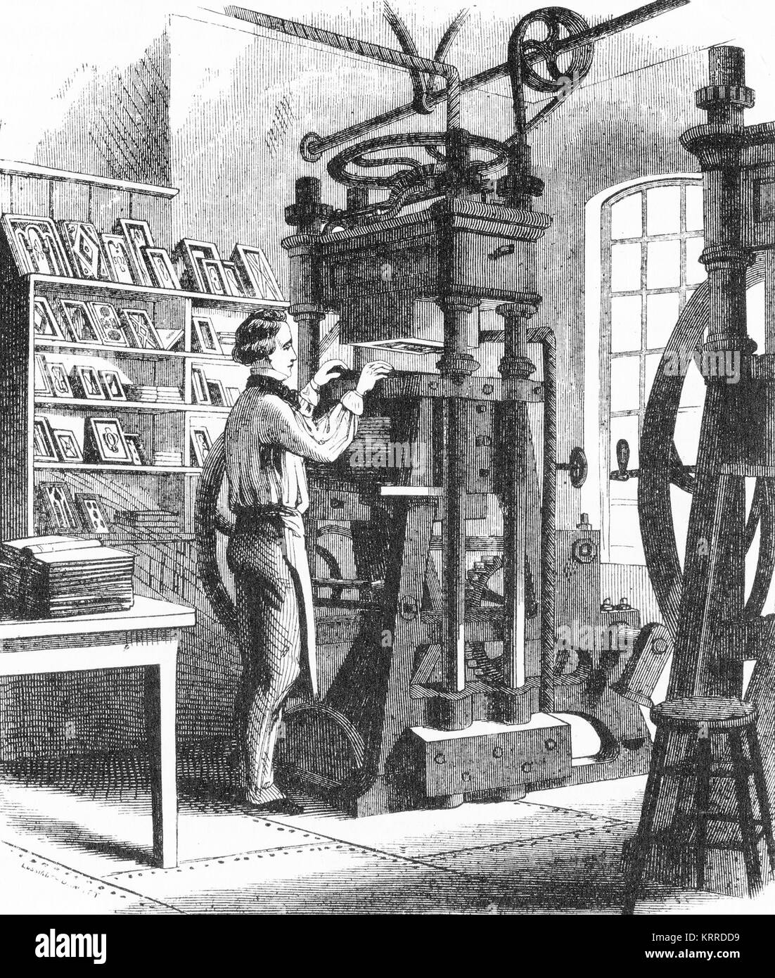 Engraving of a worker operating a stamping and engraving machine at a ...