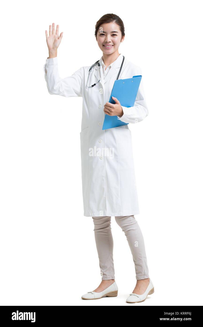 Young female doctor with medical record waving Stock Photo - Alamy