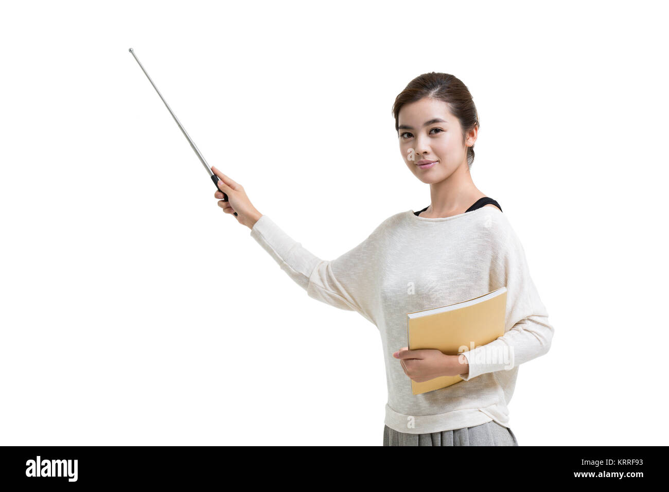 Young female teacher holding teacher's pointer Stock Photo - Alamy