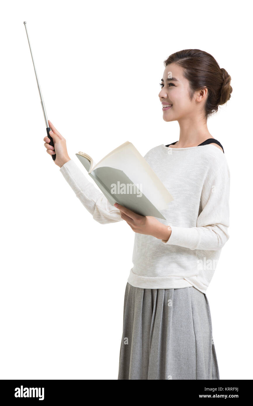 Young female teacher holding teacher's pointer Stock Photo - Alamy