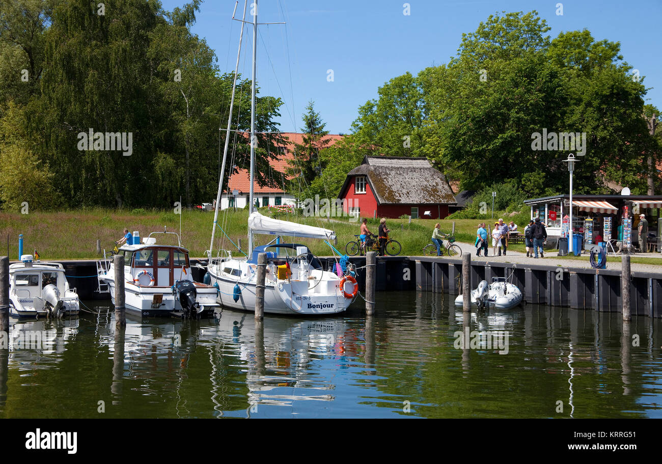 Motor boats and sailing boats at the harbour of the village Kloster ...