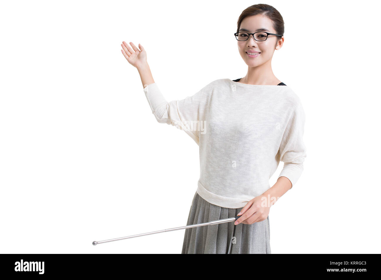Young female teacher holding teacher's pointer Stock Photo - Alamy
