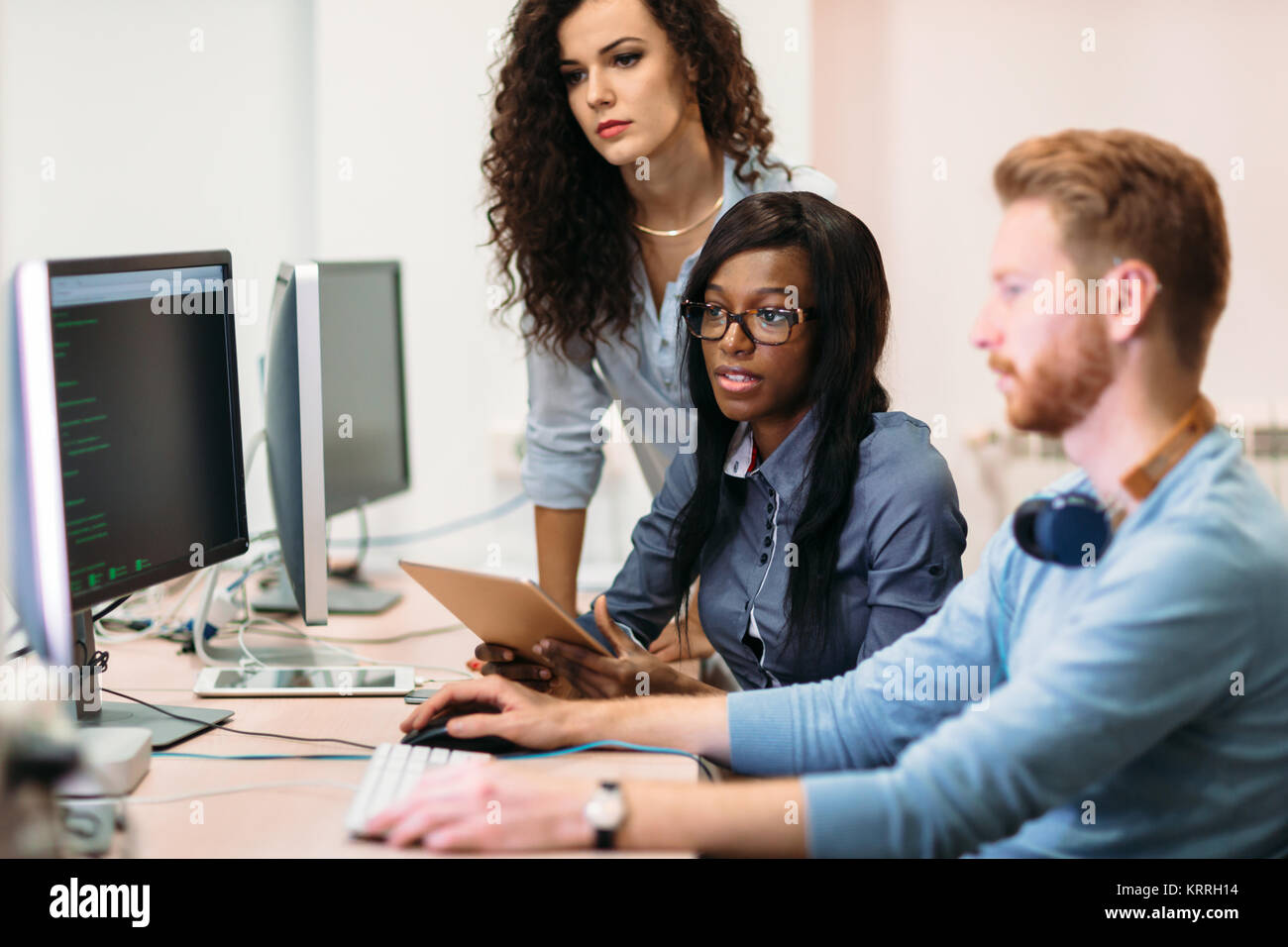 Software engineers working on project and programming in company Stock Photo - Alamy