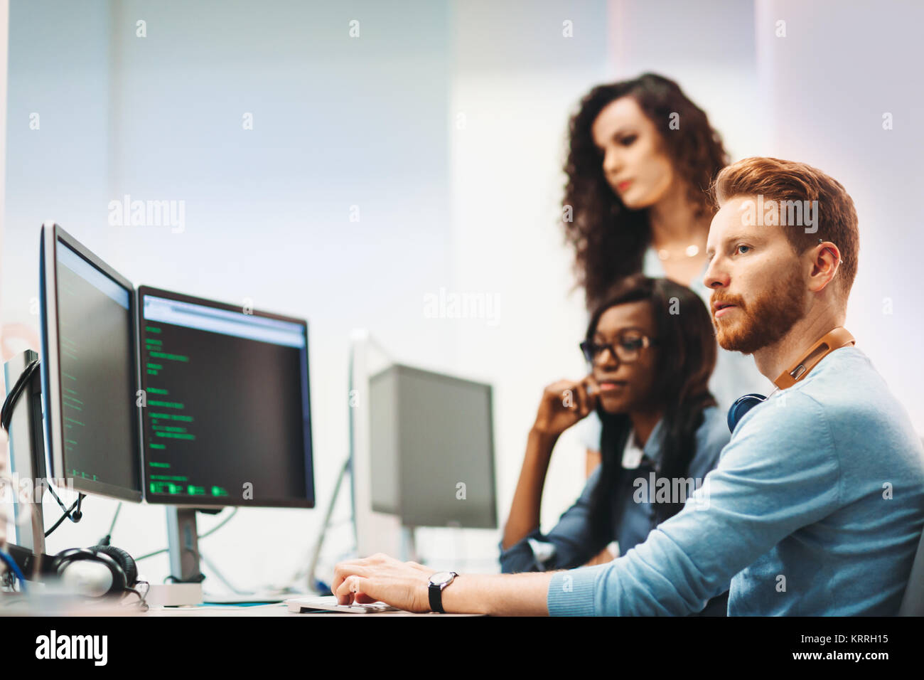 Software engineers working on project and programming in company Stock Photo - Alamy