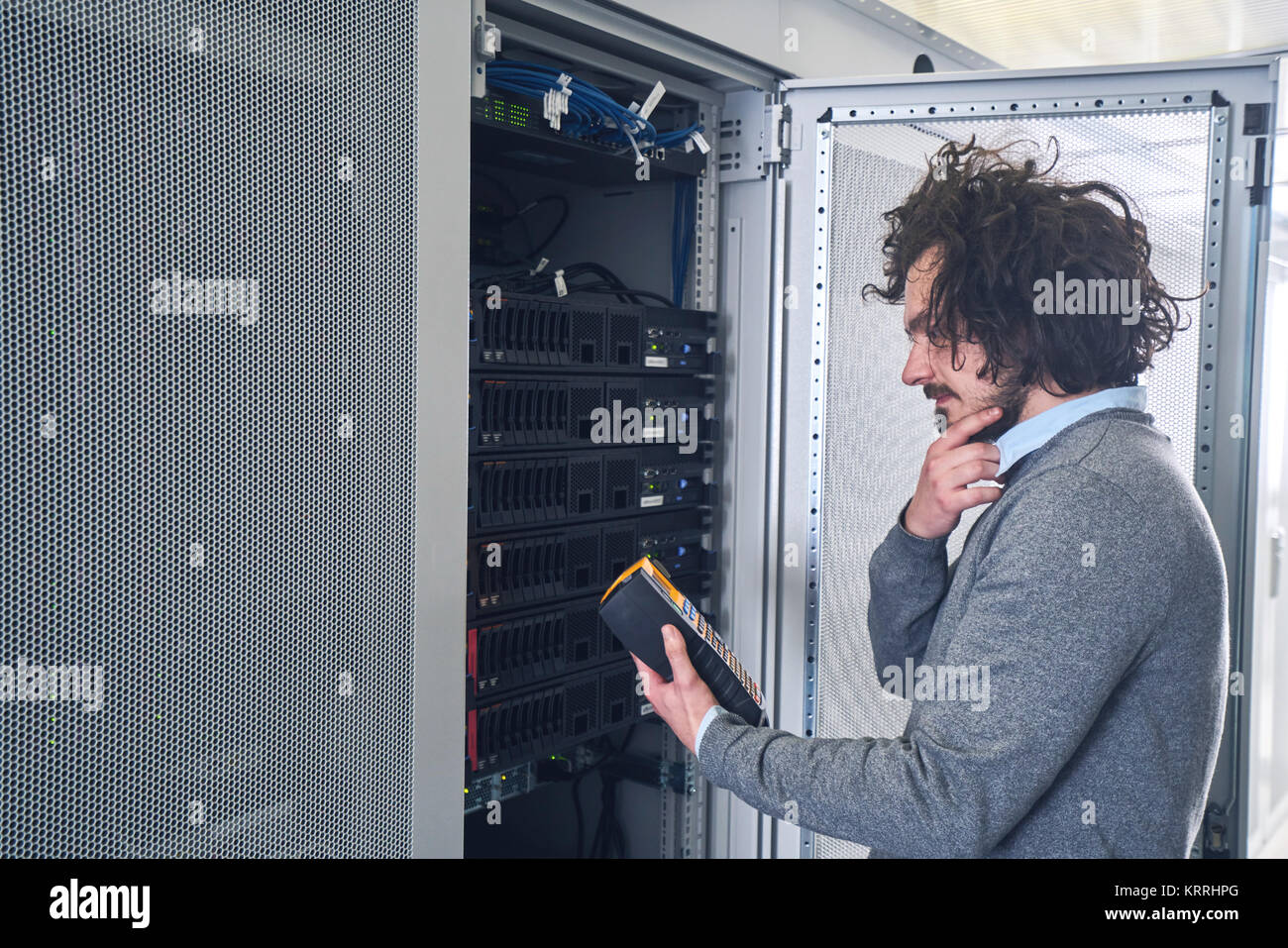 Young technician working Stock Photo - Alamy