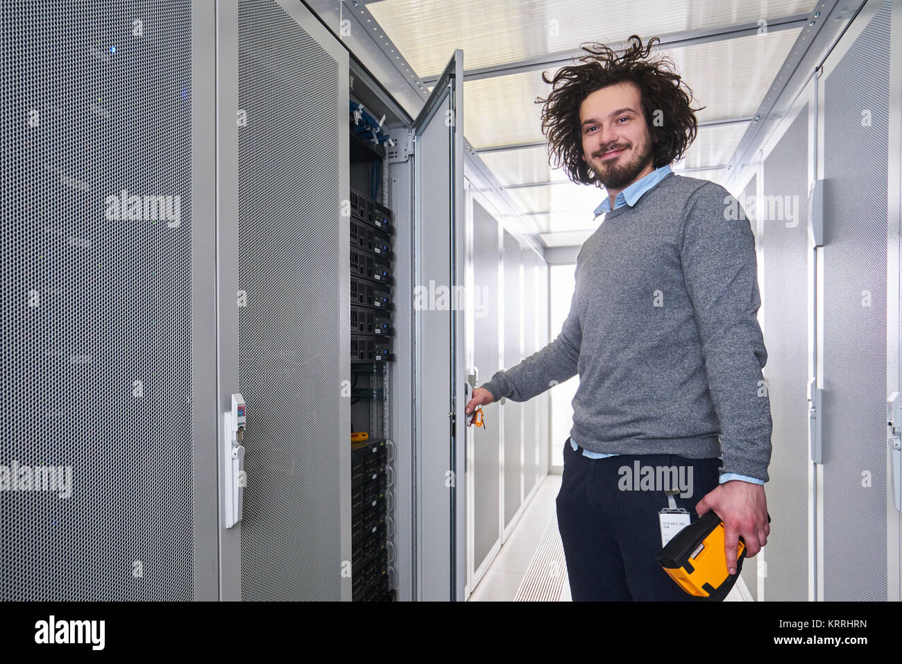 Young technician working Stock Photo - Alamy