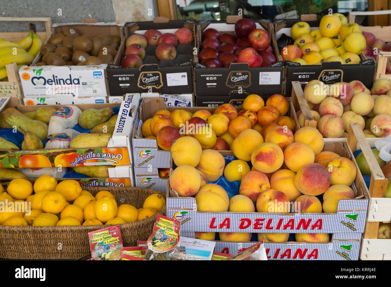 A fruit market storefront in the village of Riomaggiore, Cinque Terre ...