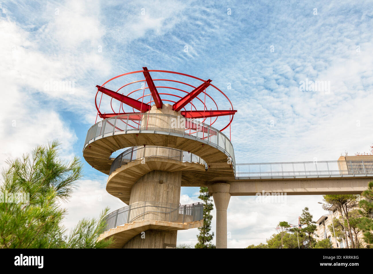 A beautiful, graphic observation deck with a spiral staircase and red ...