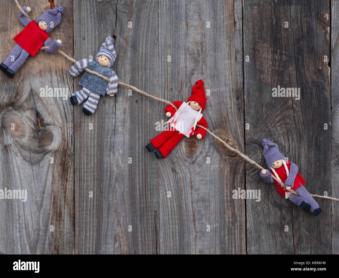 Rag dolls hanging on a rope Stock Photo - Alamy