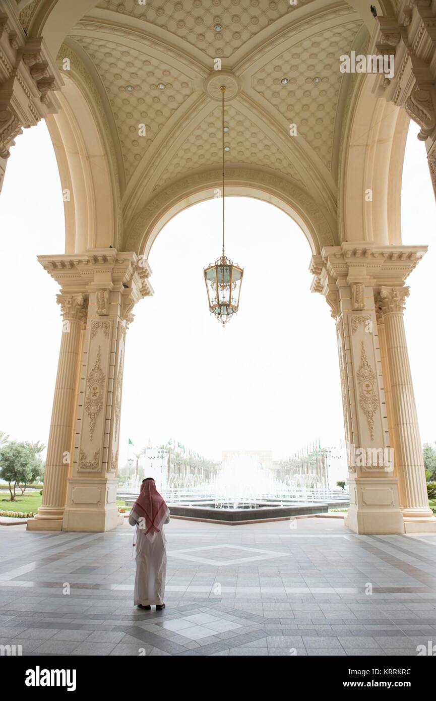 A Saudi Arabian man awaits the arrival of U.S. President Donald Trump ...