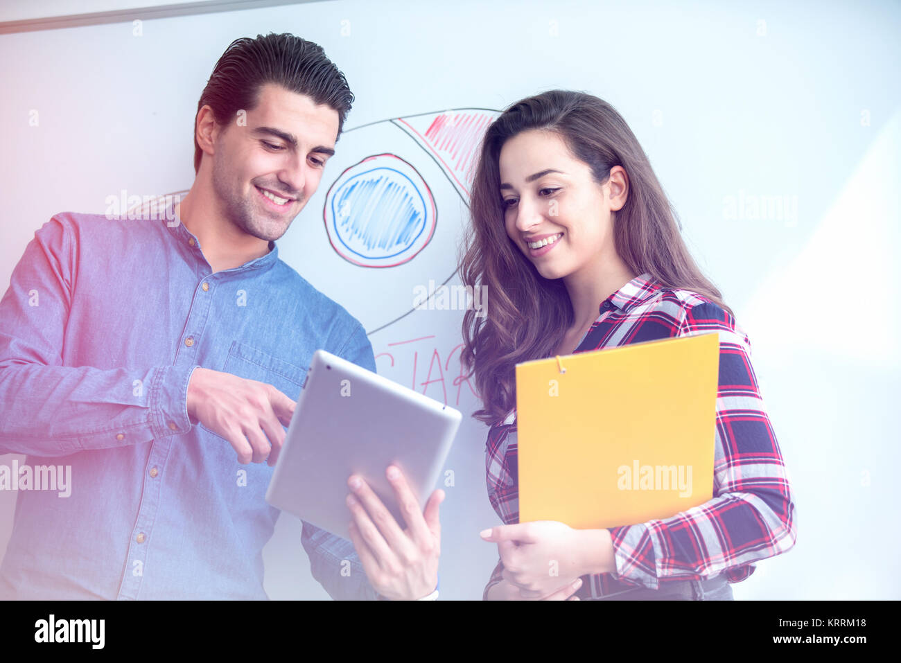 Young people comparing ideas at startup meeting board. concept Stock ...
