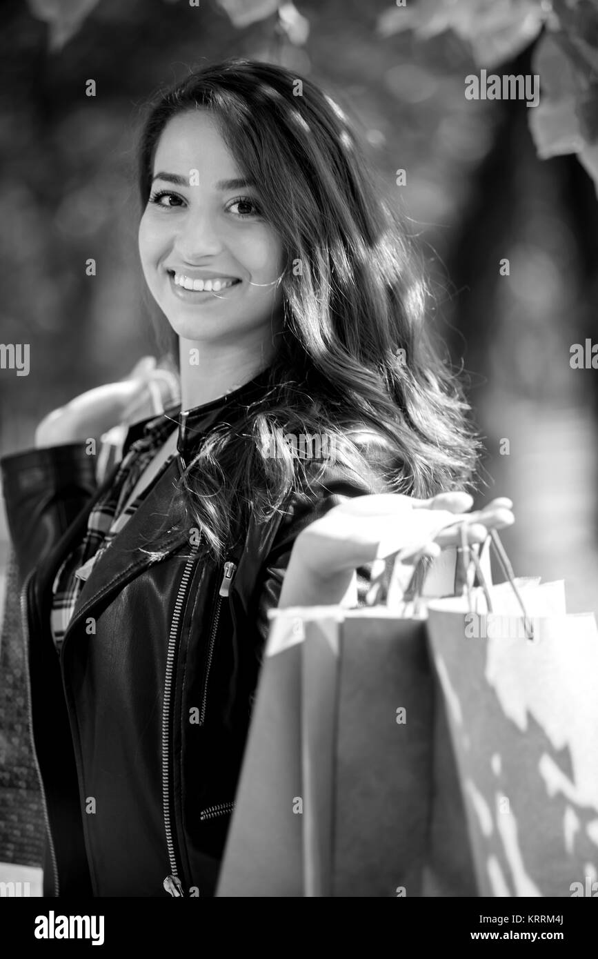 Pretty girl with shopping bags having fun, shopper, shopaholic Stock ...