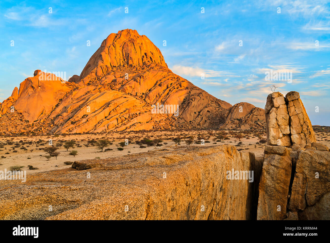 Rock ledge and mountain Stock Photo - Alamy
