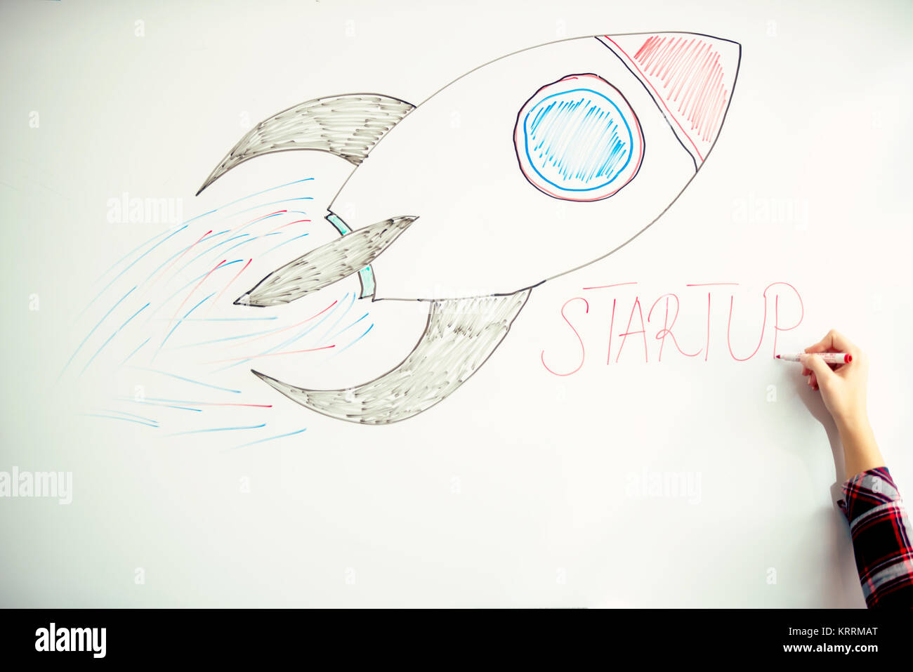 Startup rocket on whiteboard, concept Stock Photo - Alamy