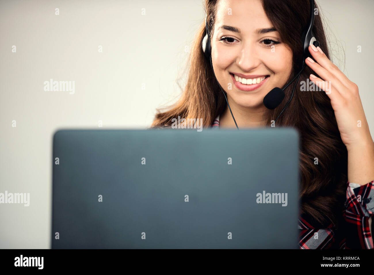 Young beautifull girl using computer Stock Photo - Alamy