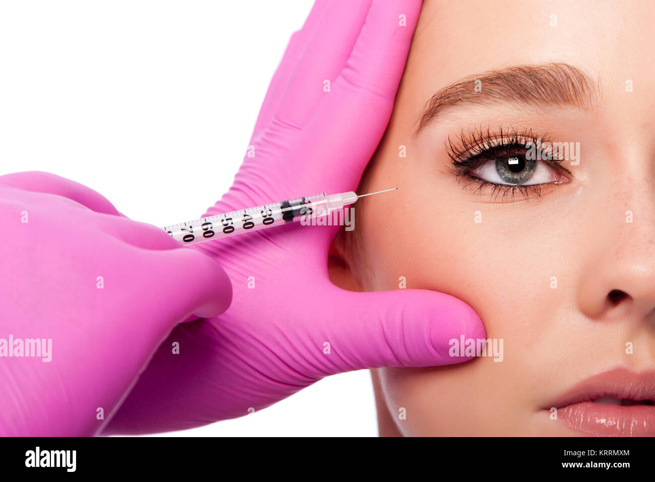Beauty collagen filler injection in crows feet at eye Stock Photo - Alamy