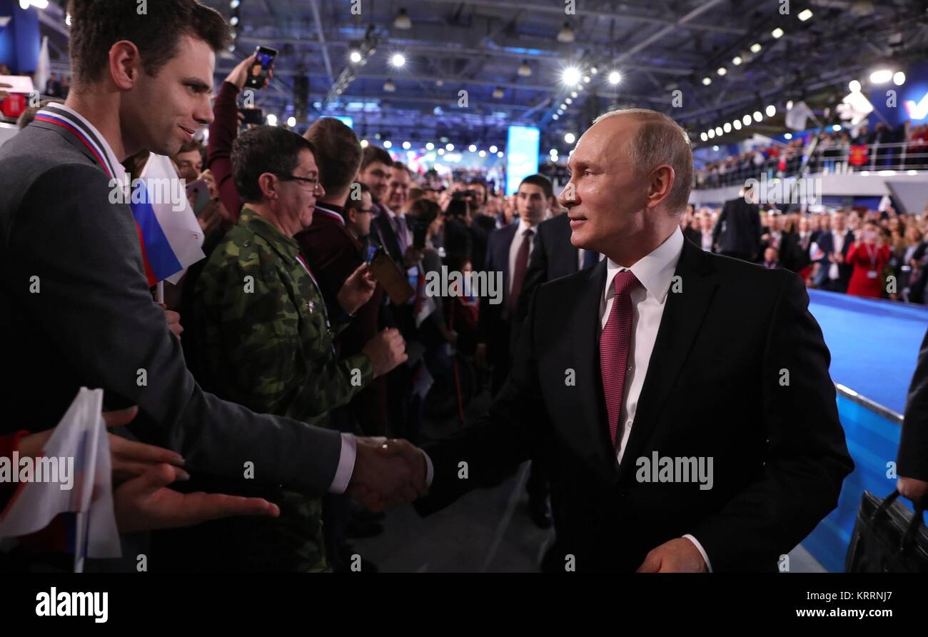 Russian President Vladimir Putin greets supporters at the All-Russia ...