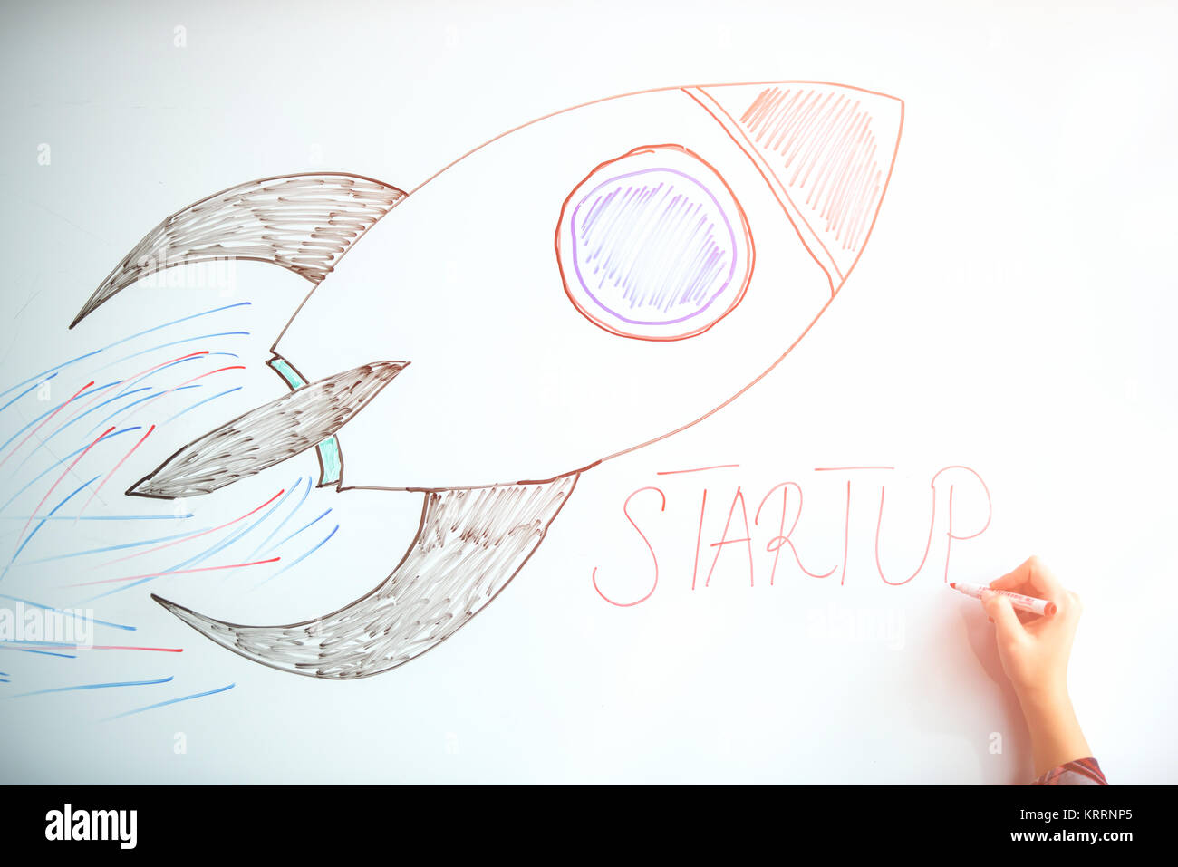 Startup rocket on whiteboard, concept Stock Photo - Alamy