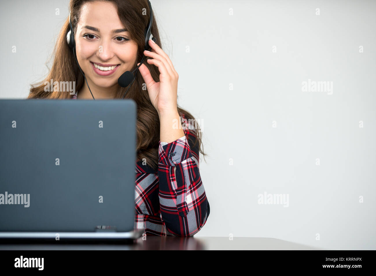 Young beautifull girl using computer Stock Photo - Alamy