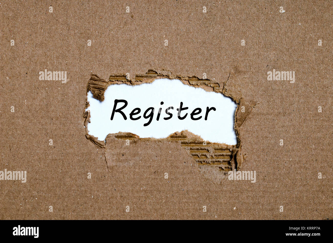 The word register appearing behind torn paper Stock Photo - Alamy