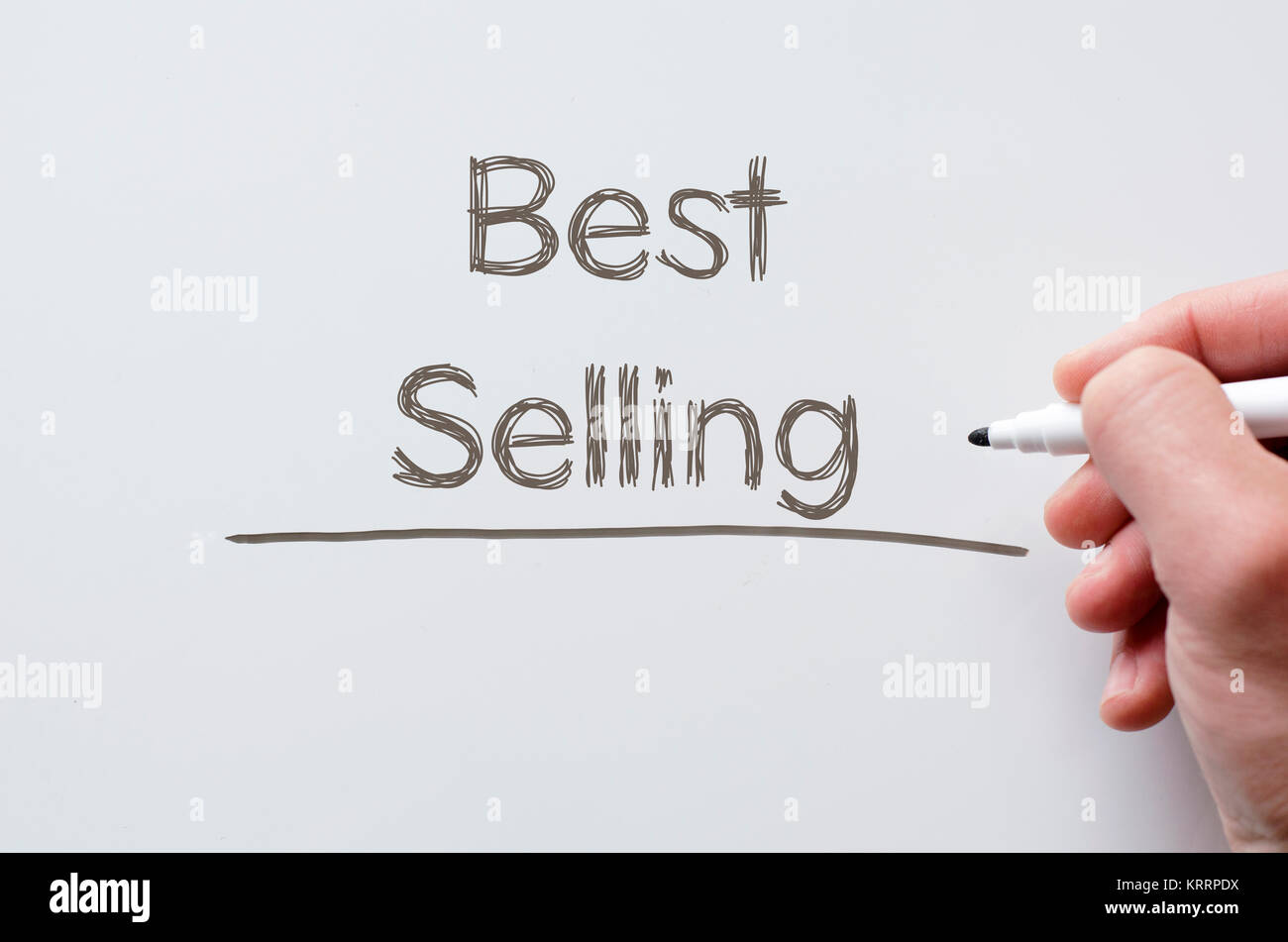Best selling written on whiteboard Stock Photo - Alamy