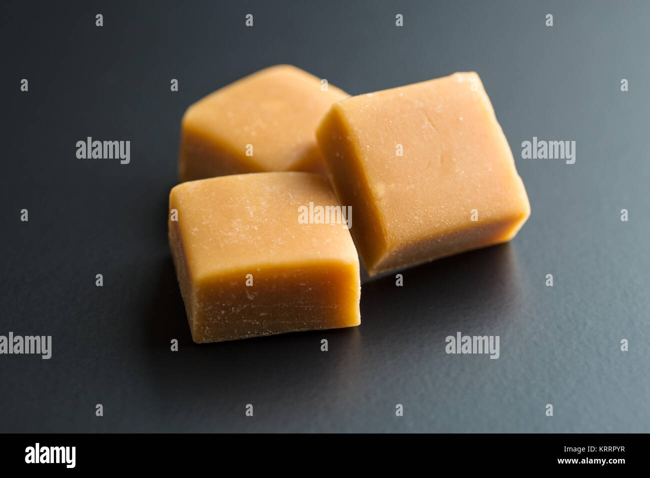 Sweet caramel candies Stock Photo - Alamy
