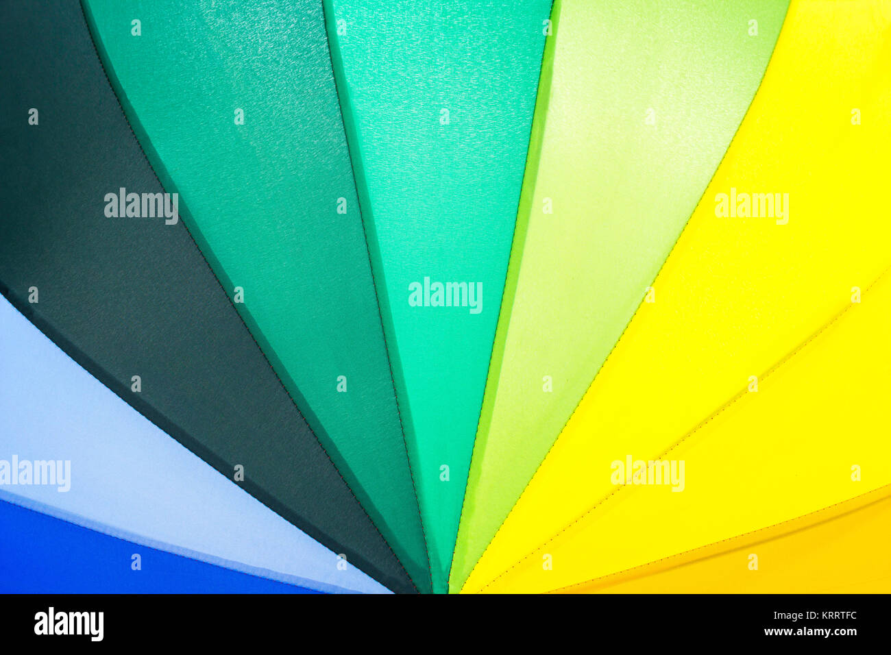 Beautiful rainbow colored umbrella pattern Stock Photo - Alamy