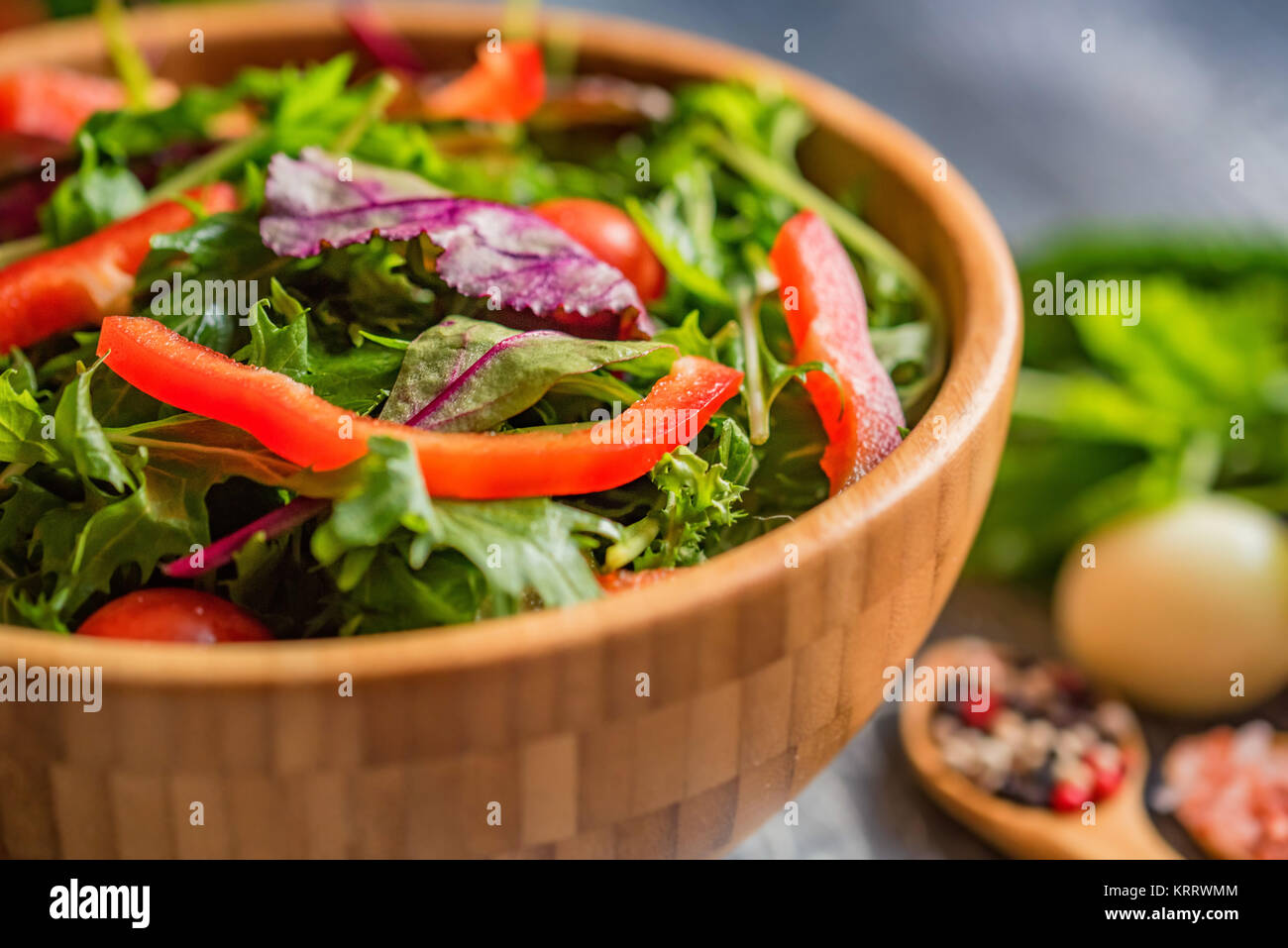 Fresh rustic vegetable salad on rustic background Stock Photo - Alamy