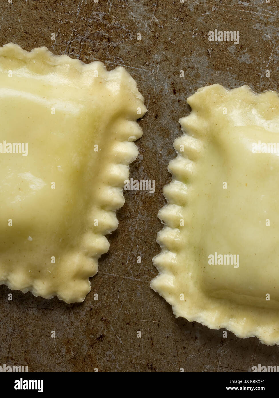 rustic uncooked italian ravioli pasta Stock Photo - Alamy