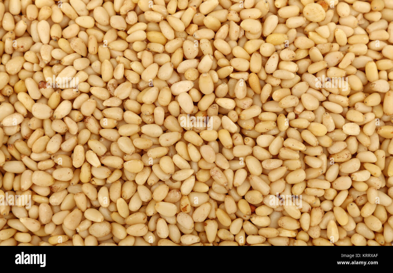 Peeled pine nuts close up Stock Photo - Alamy
