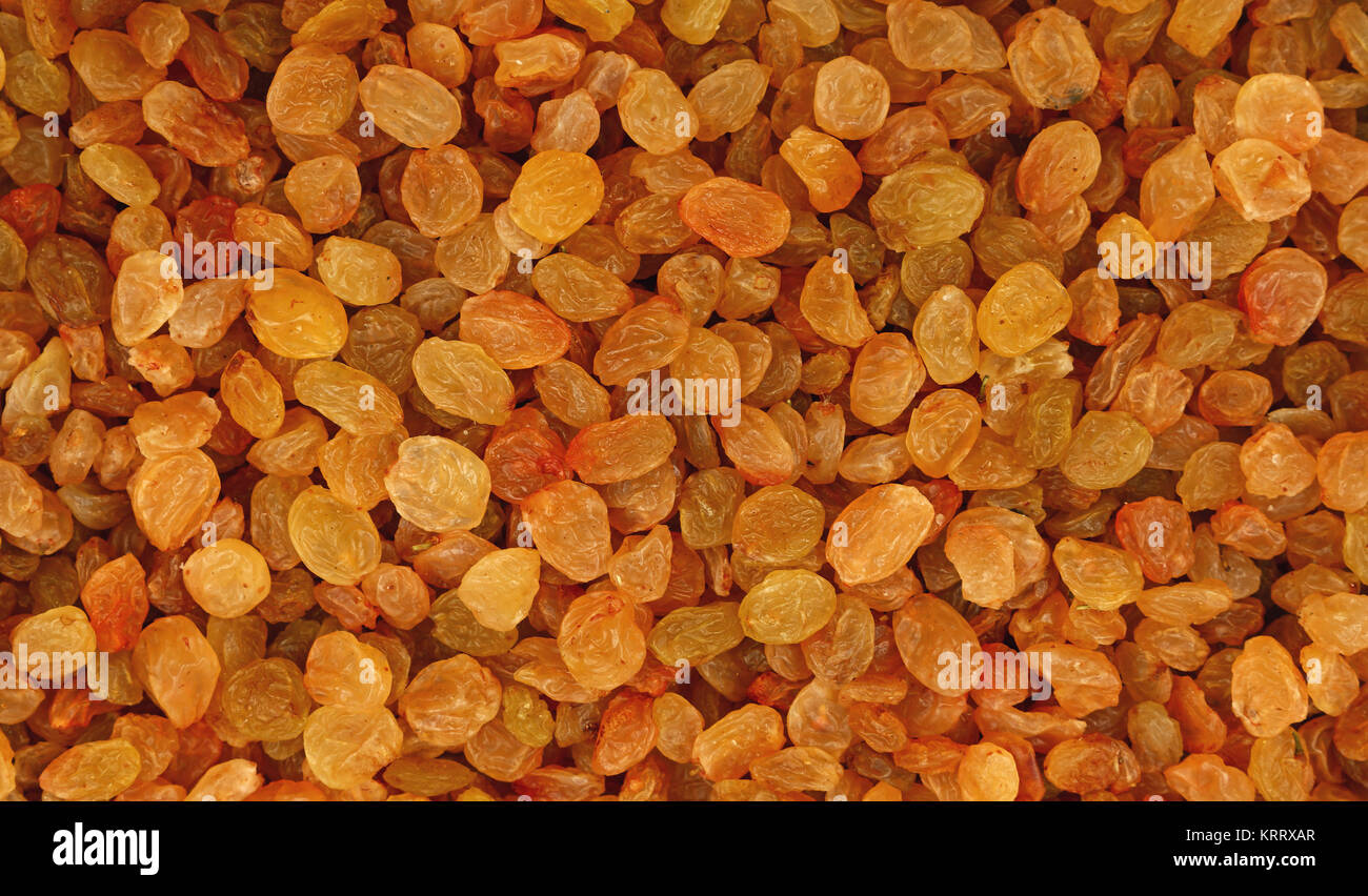 White grape small raisin close up background Stock Photo - Alamy