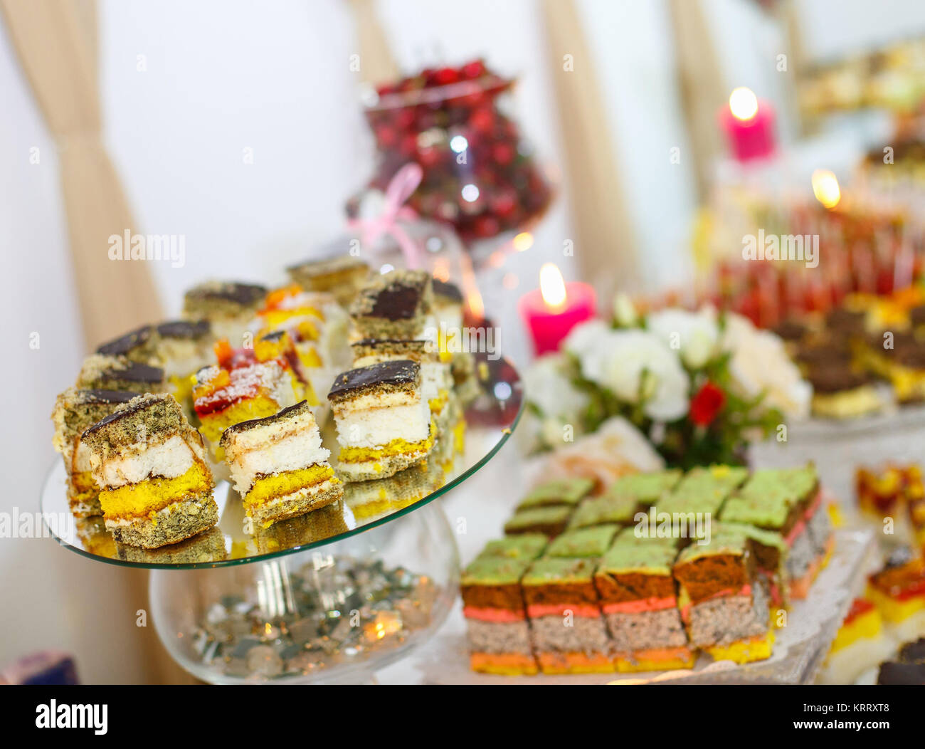 buffet table with pastries, sweet cream, strawberry and dessert Stock ...