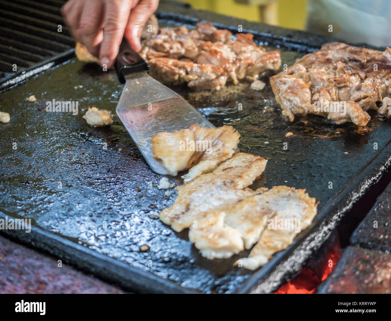 cuban cuisine grilling fish and meat Stock Photo - Alamy
