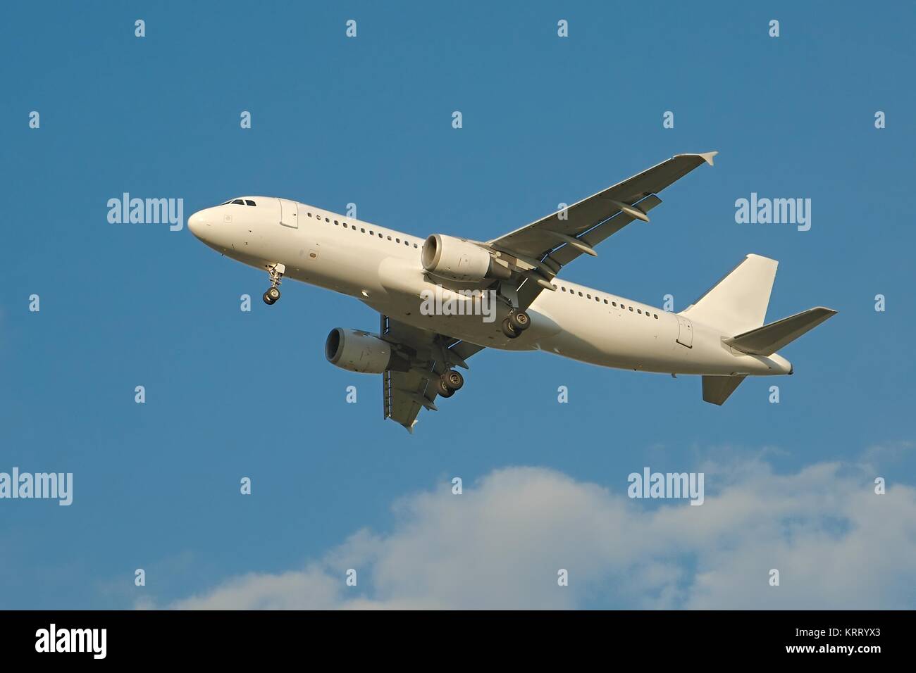 Commercial Plane Landing Stock Photo - Alamy