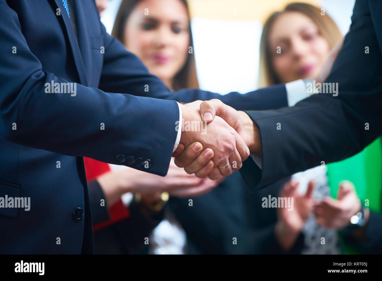 Business handshake in office Stock Photo - Alamy