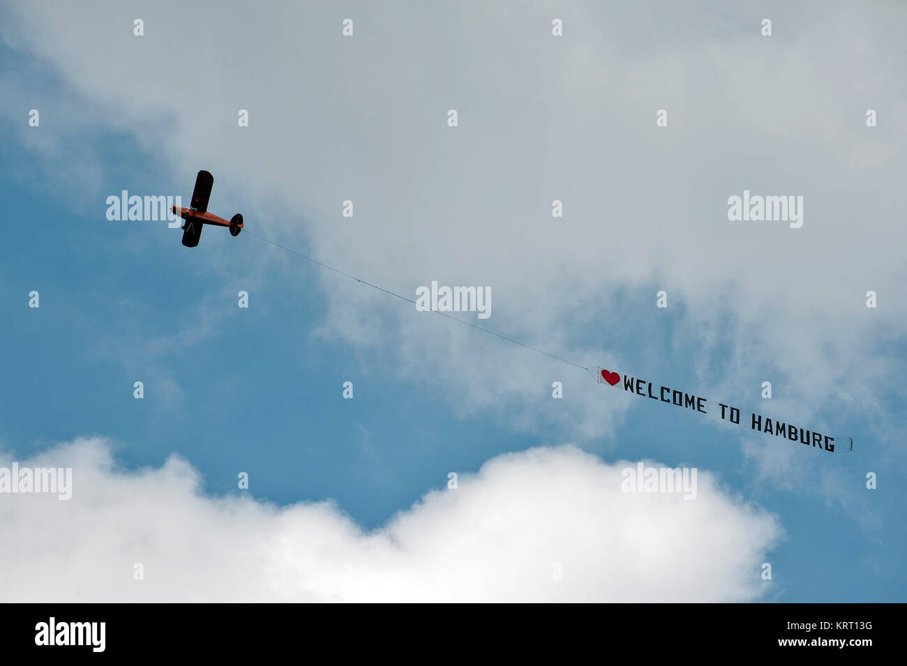 Airplane with Message: Welcome to Hamburg! Stock Photo - Alamy