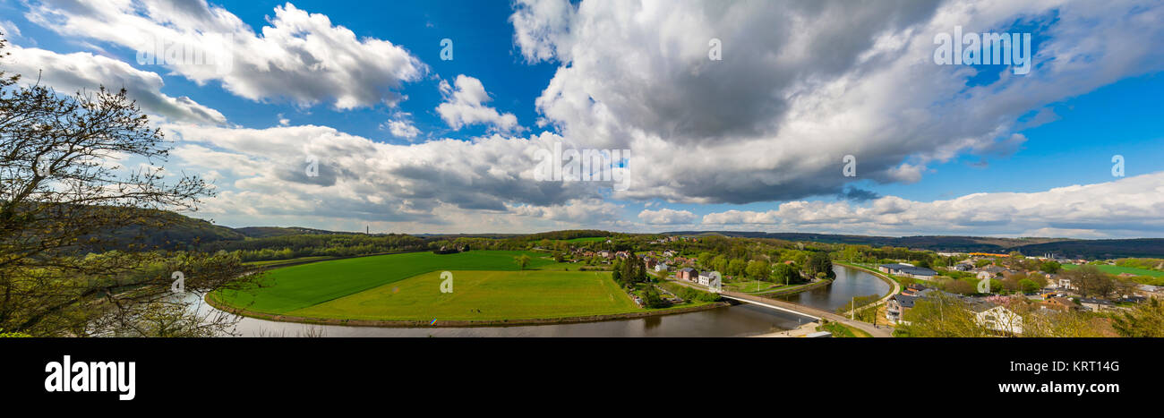 River looping around the green fields, summer day, Floreffe, Belgium ...