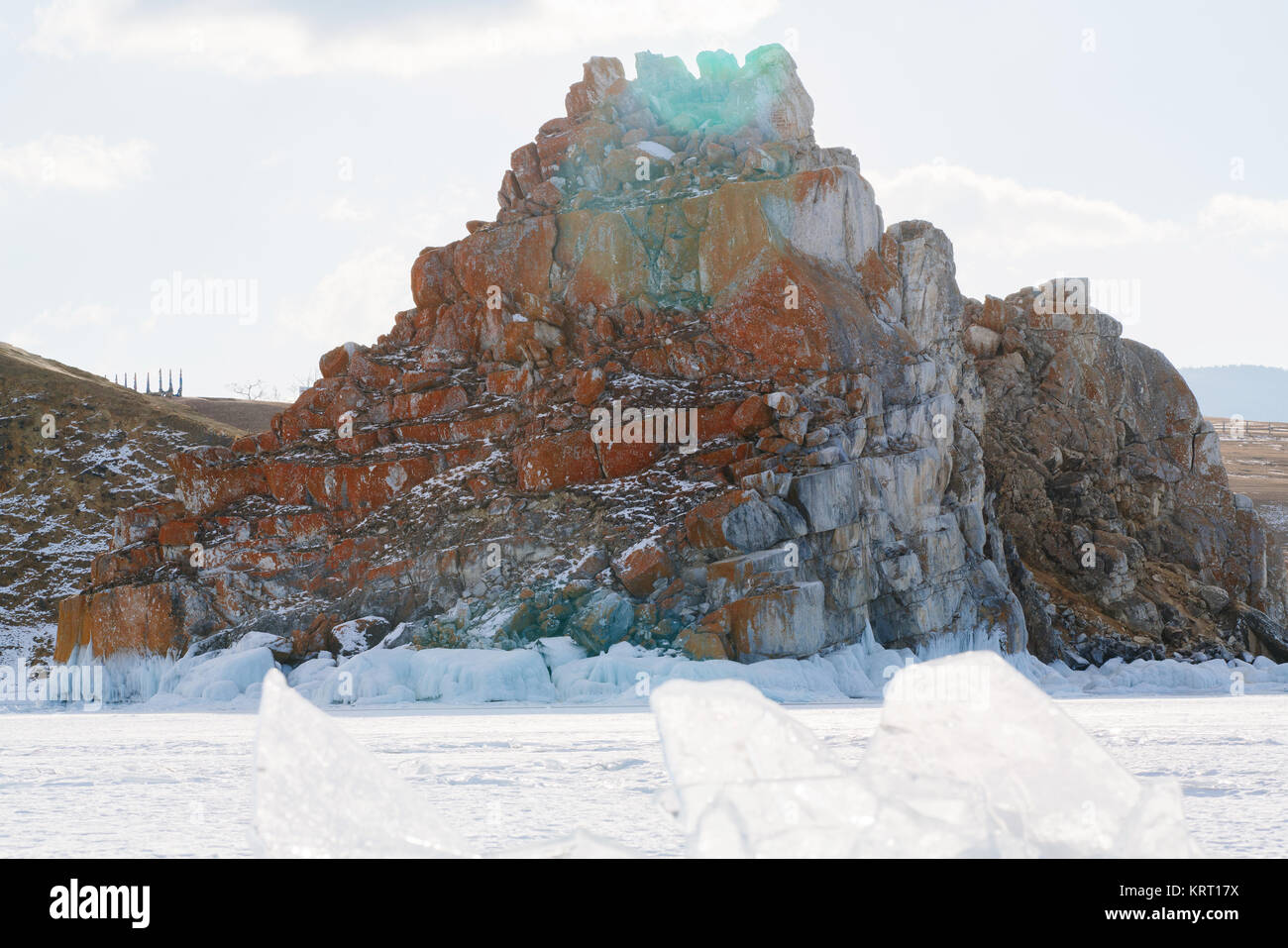 View of the Shamanka Rock and the frozen Lake Baikal Stock Photo - Alamy