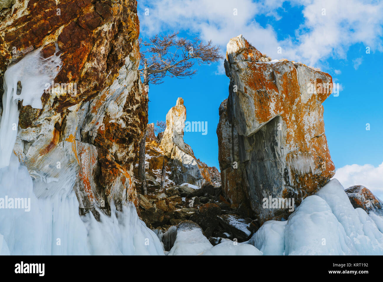 View of the Shamanka Rock and the frozen Lake Baikal Stock Photo - Alamy