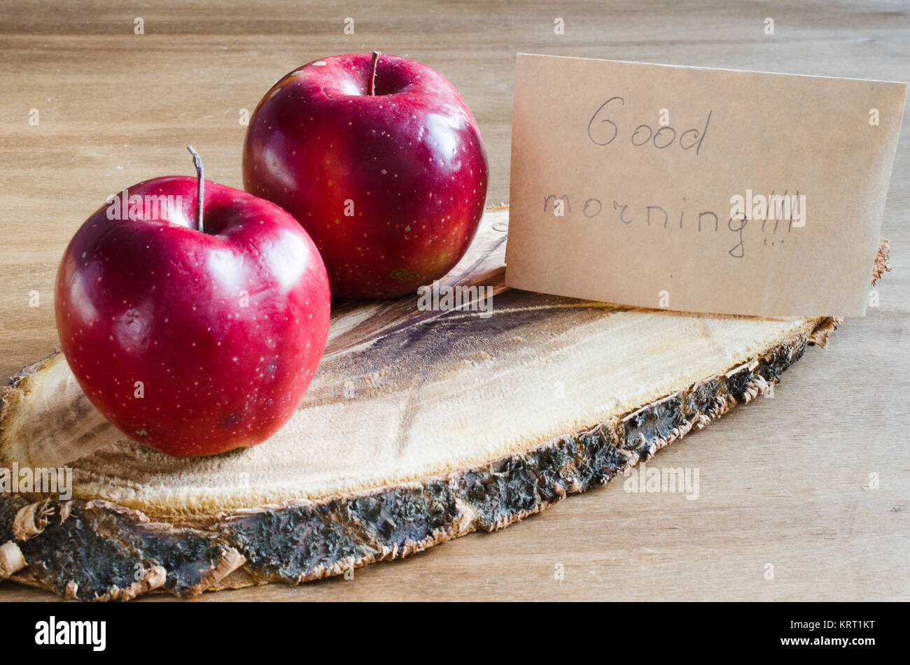 Organic apples and Good morning note on rustic wooden background Stock ...