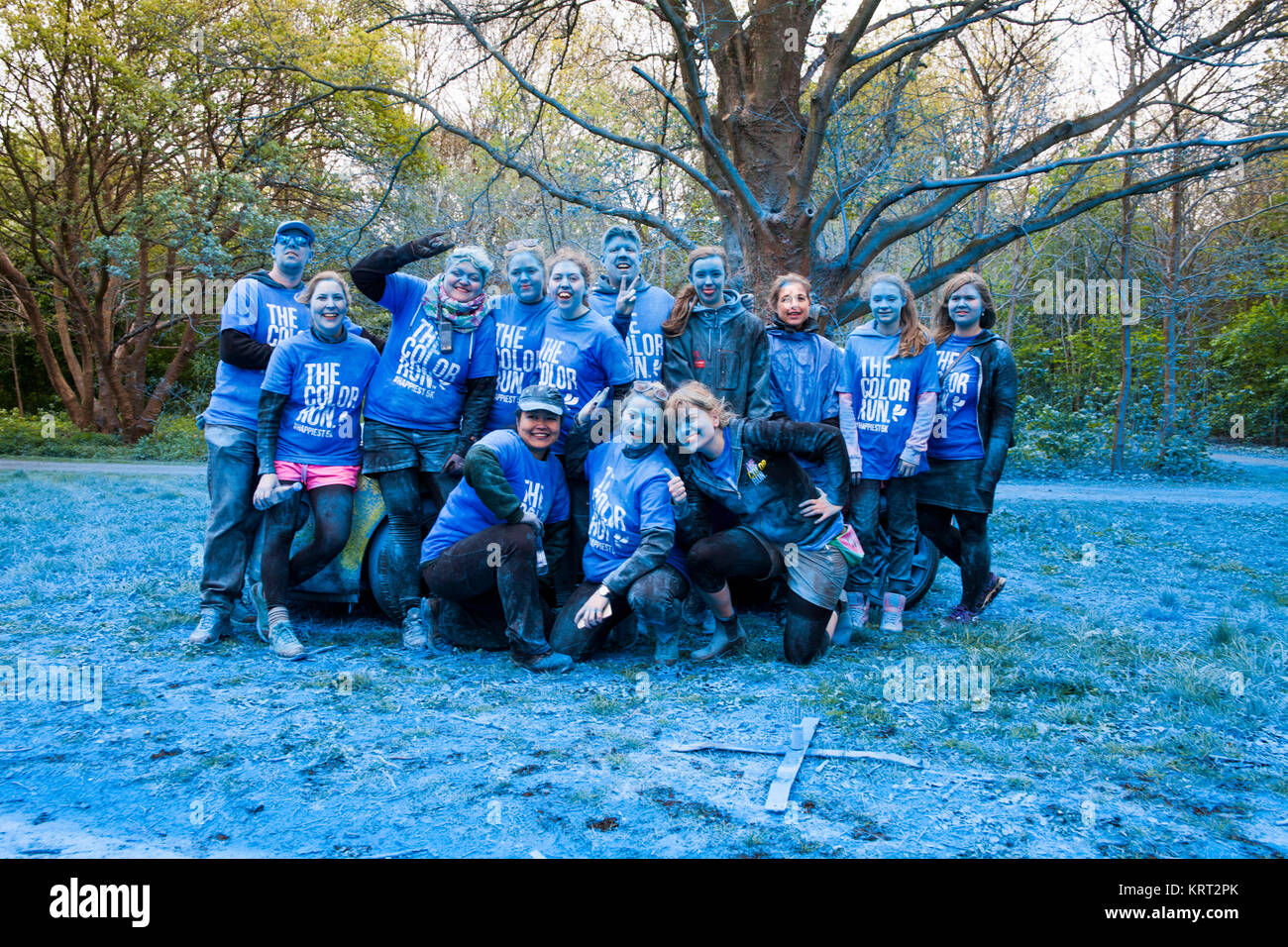 A team has just passed the blue color station at the 2015 Color Run in ...