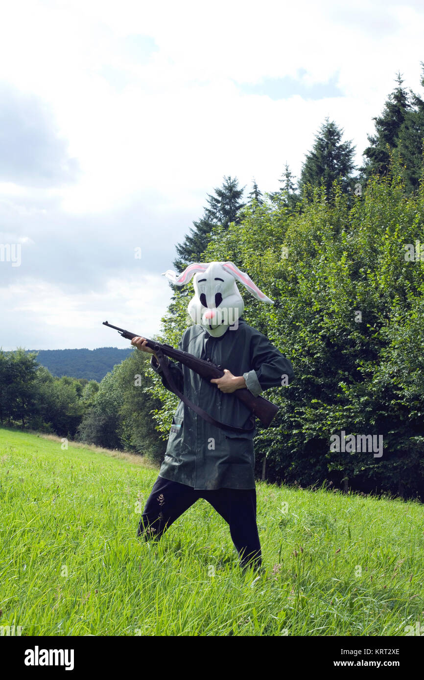 white rabbit hunter Stock Photo - Alamy