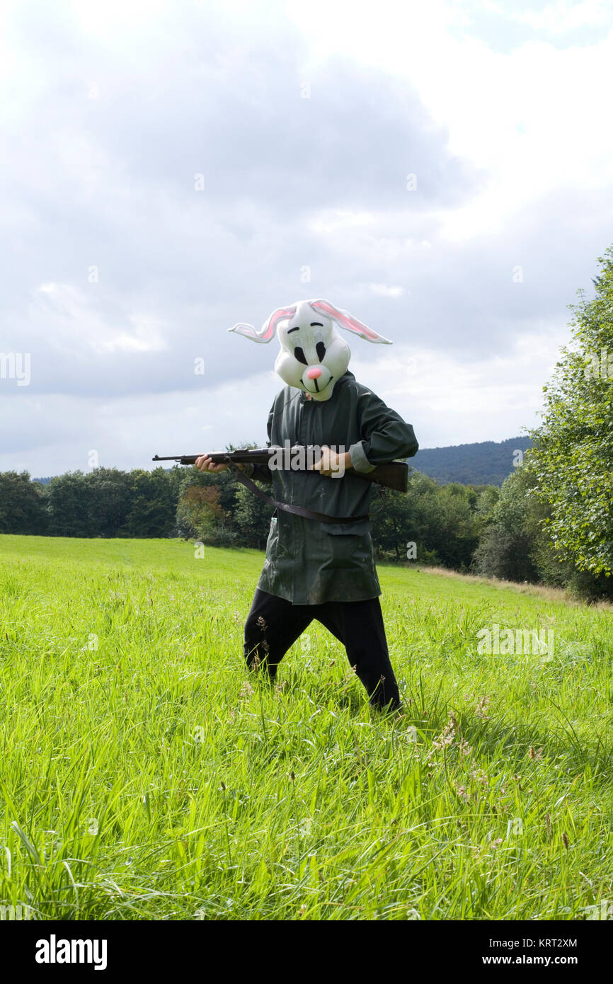 white rabbit hunter Stock Photo - Alamy