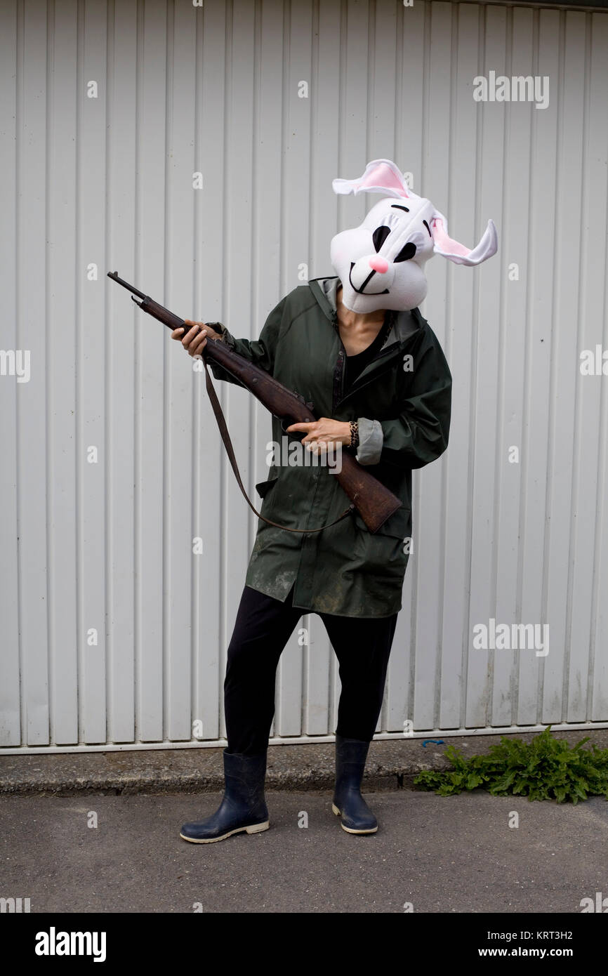 white rabbit hunter Stock Photo - Alamy