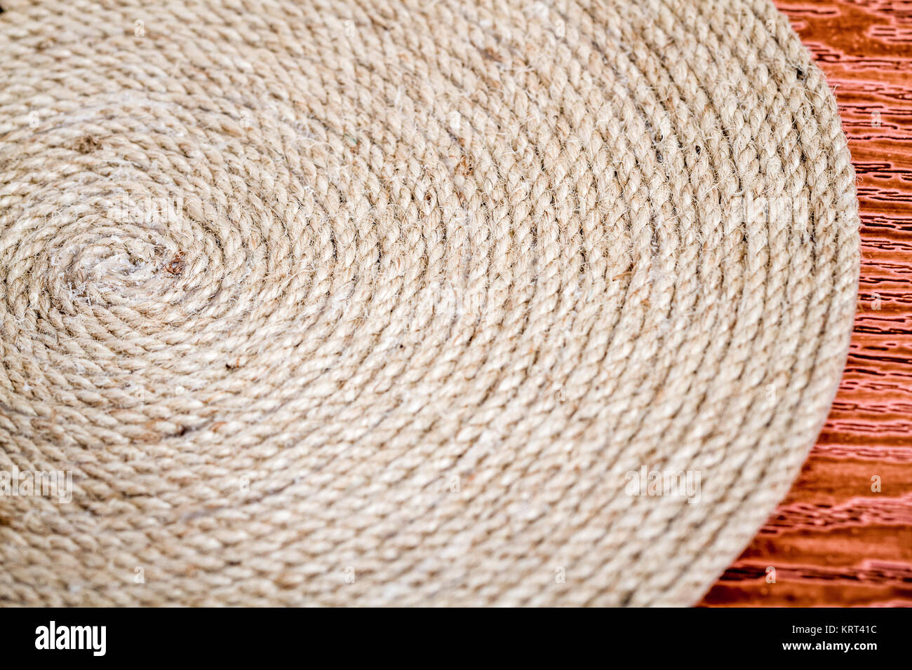 Handmade table mat of Jute Rope twisted in a spiral form Stock Photo ...