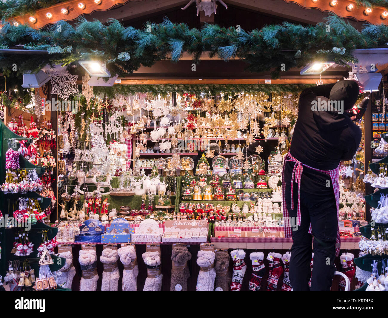 Attractive market stall selling Christmas baubles and tree decorations ...